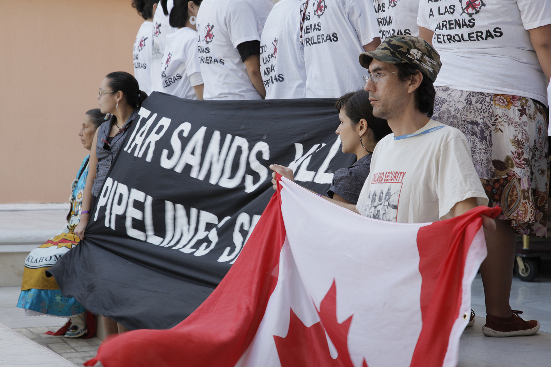 Indigenous protesters at COP 16 - 3 - Revolution